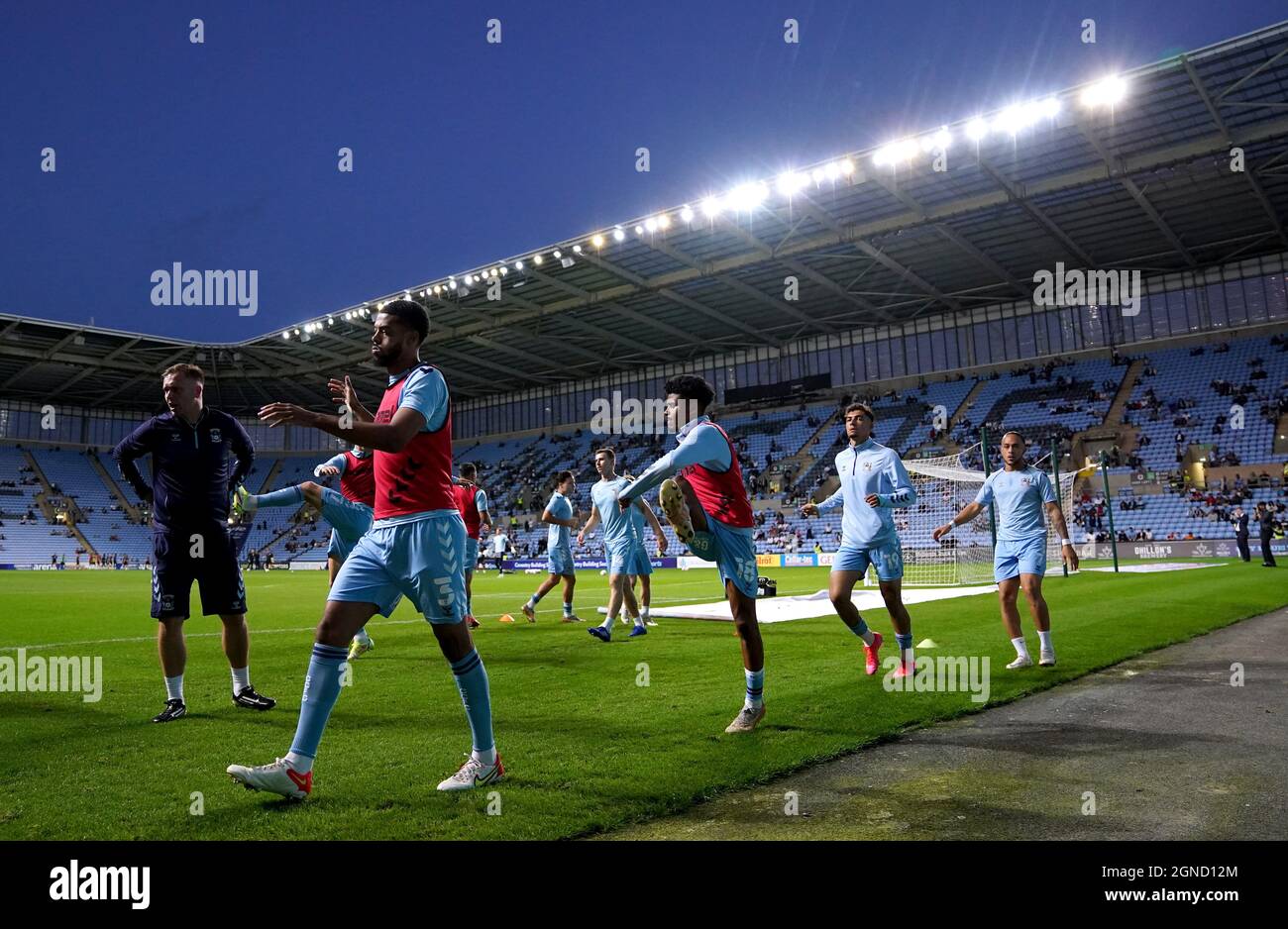 Coventry City players warm up on the pitch ahead of the Sky Bet ...