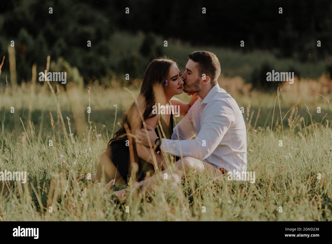 Bosnian young loving couple hugging in the field Stock Photo - Alamy