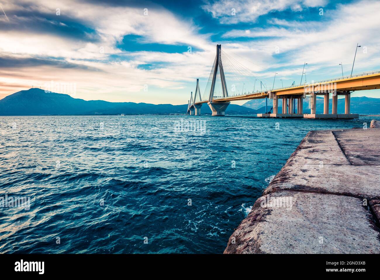 Dramatic morning view of Rion-Antirion Bridge. Colorful spring scene of ...