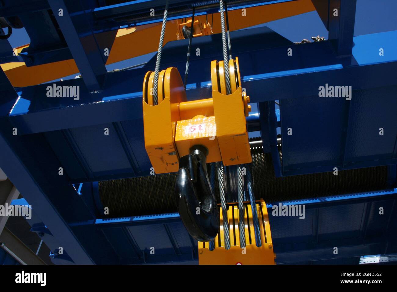 Powerful crane hook. Industrial background Stock Photo - Alamy
