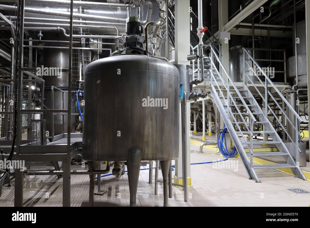 Inside the dairy factory. Food processing plant Stock Photo - Alamy