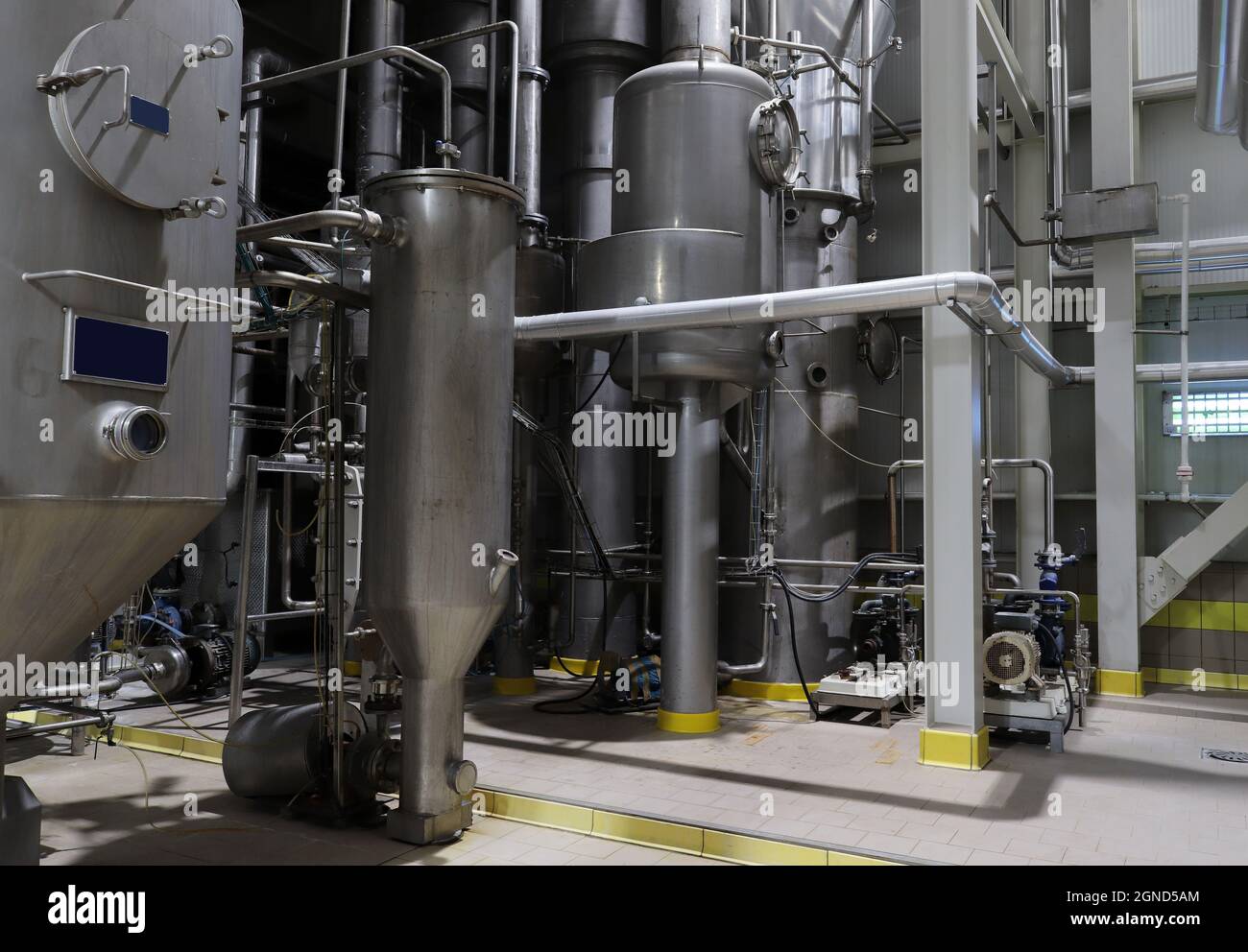Inside the dairy factory. Food processing plant Stock Photo - Alamy