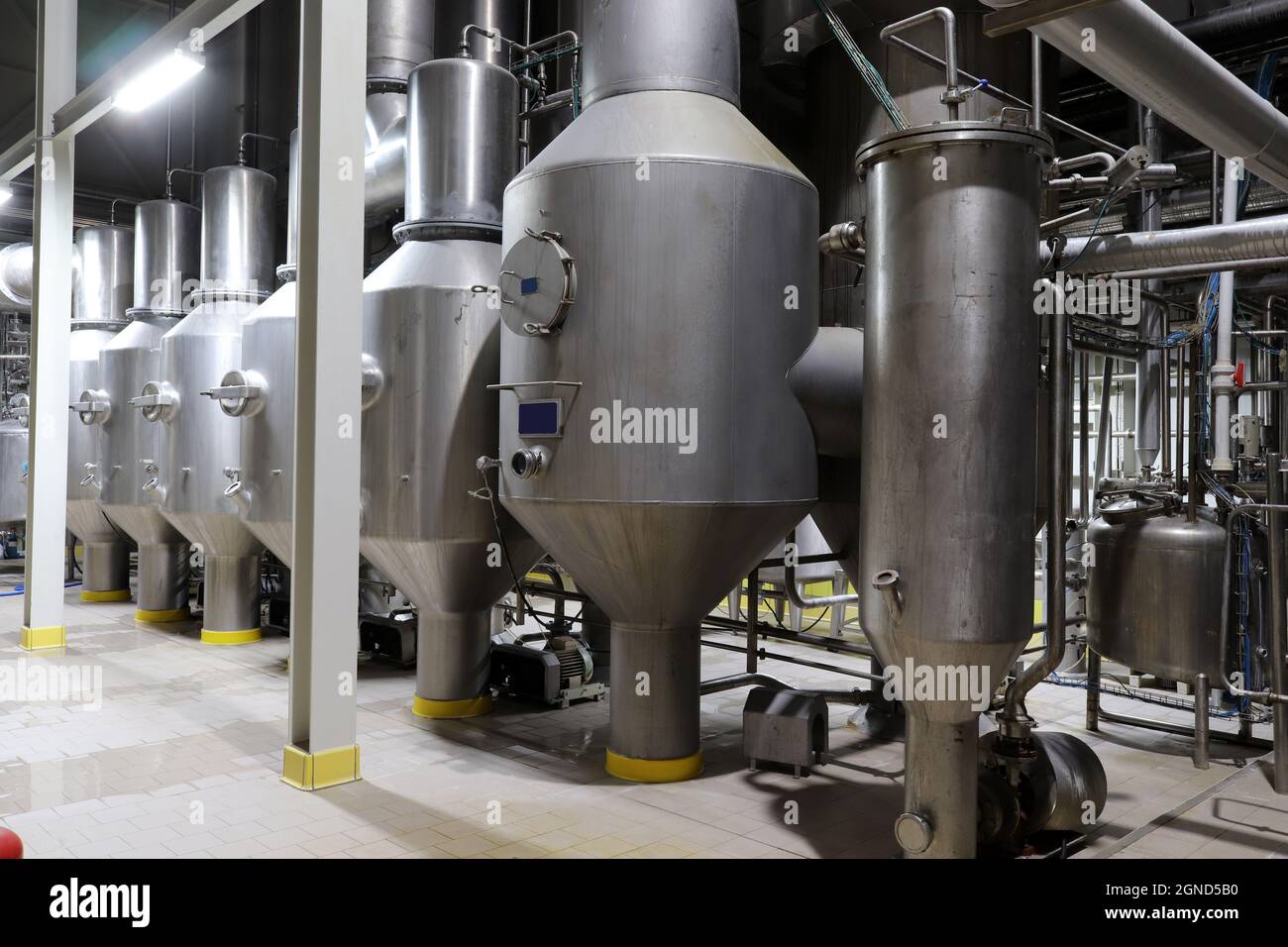 Inside the dairy factory. Food processing plant Stock Photo - Alamy