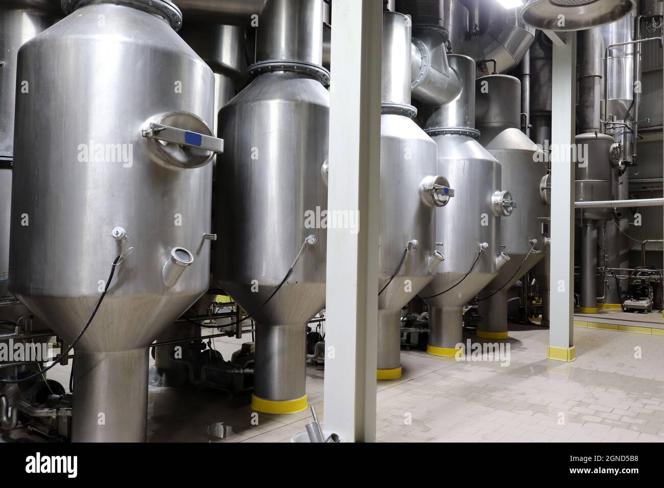 Inside the dairy factory. Food processing plant Stock Photo - Alamy
