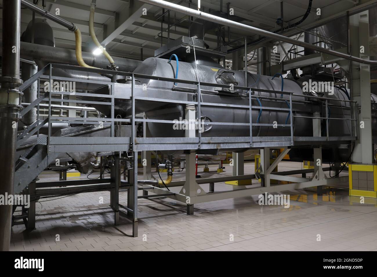 Inside the dairy factory. Food processing plant Stock Photo - Alamy