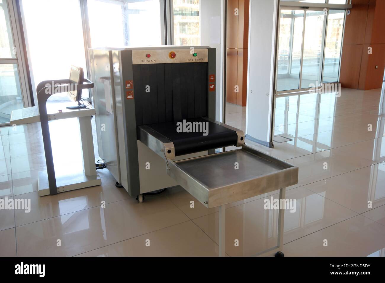 Building entrance security checkpoint. X-ray scanning device Stock ...
