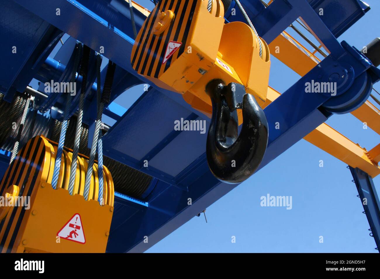 Powerful crane hook. Industrial background Stock Photo - Alamy