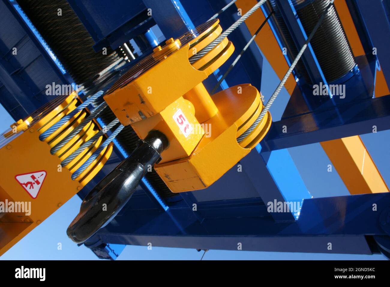 Powerful crane hook. Industrial background Stock Photo - Alamy