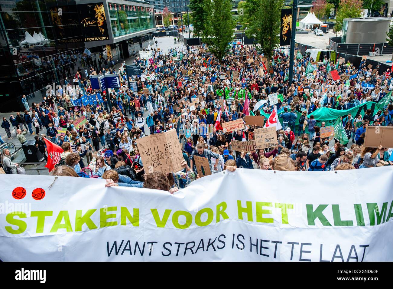 Utrecht, Netherlands. 24th Sep, 2021. Protesters hold banners and ...
