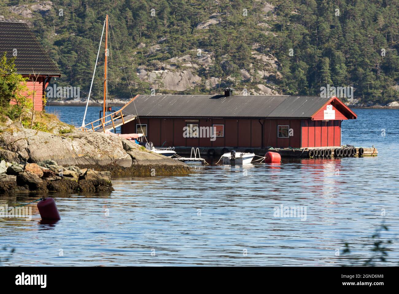 colorful wooden houses on the sea in Osoyro in Norway Stock Photo - Alamy