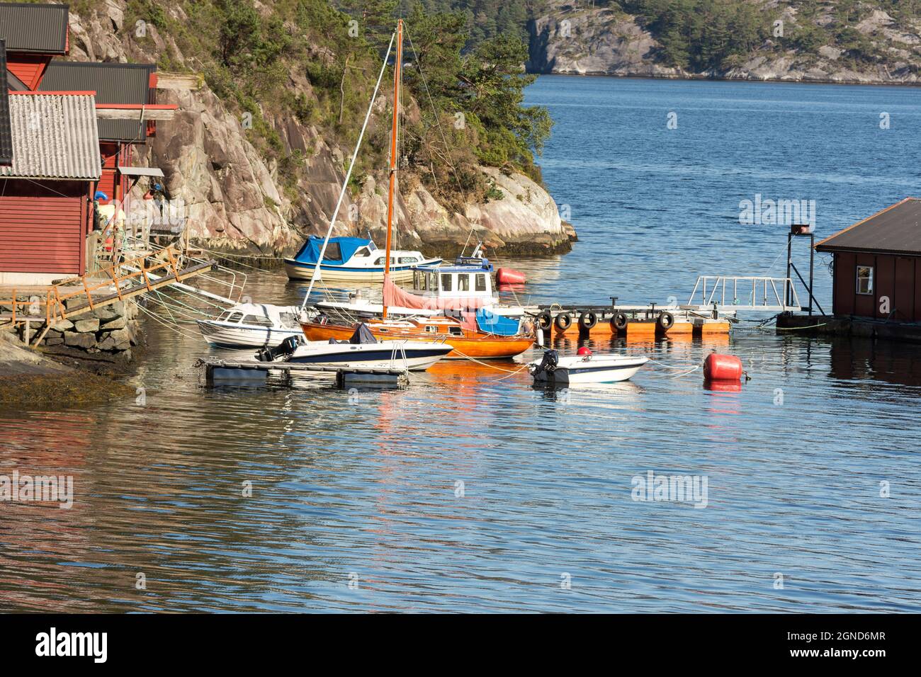 colorful wooden houses on the sea in Osoyro in Norway Stock Photo - Alamy