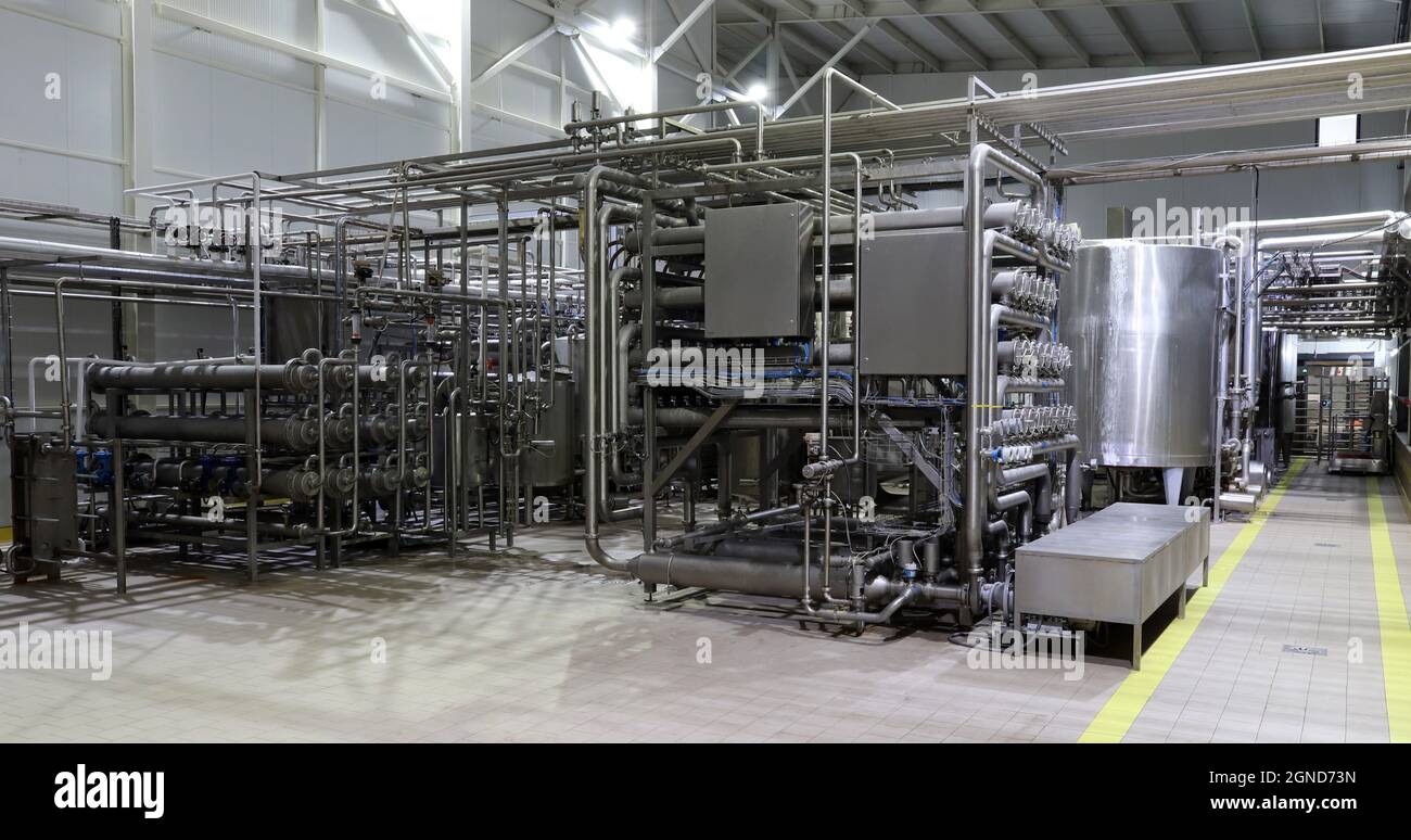 Inside the dairy factory. Food processing plant Stock Photo - Alamy