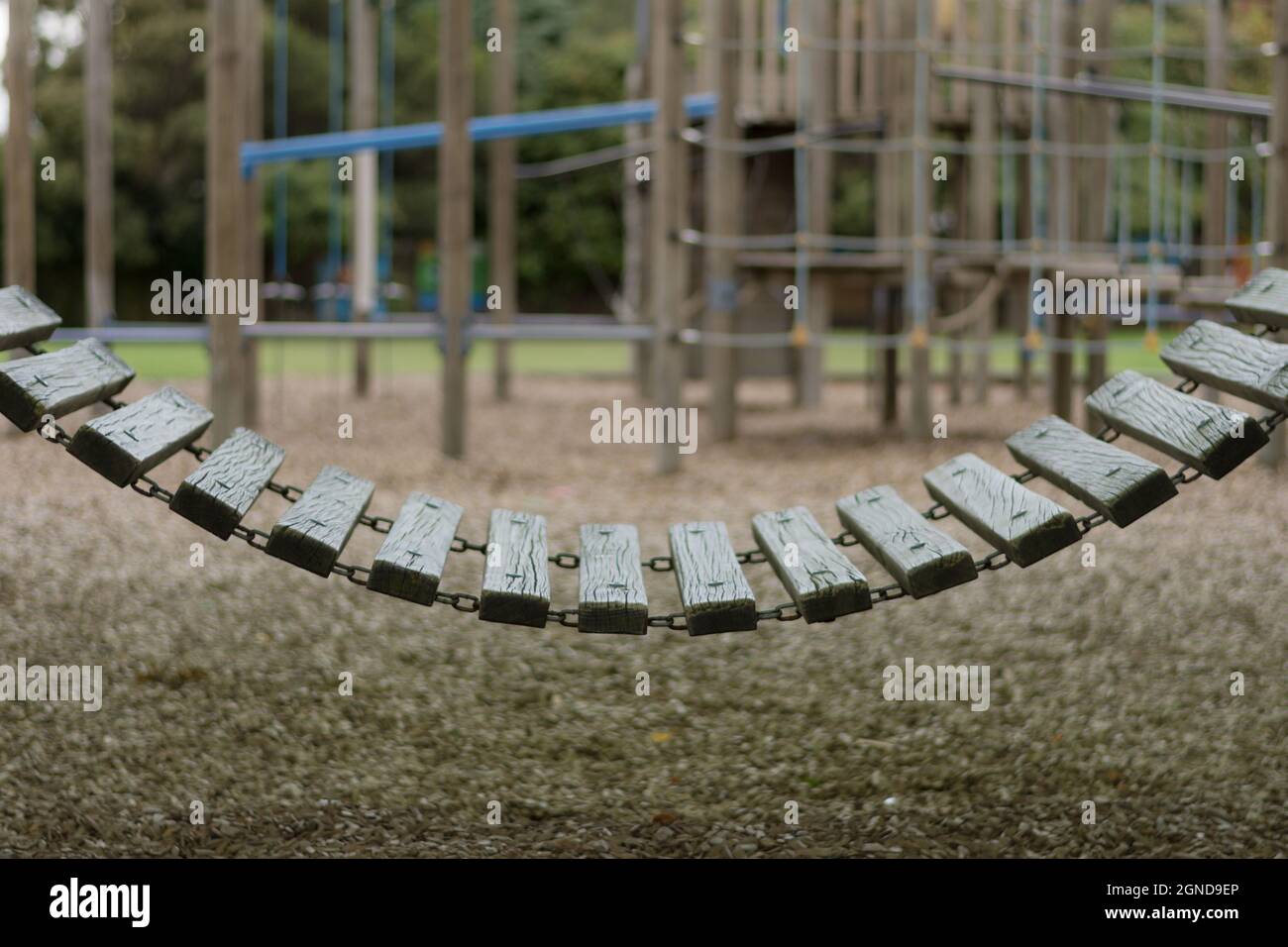Swing bridge in a children's playground Stock Photo - Alamy