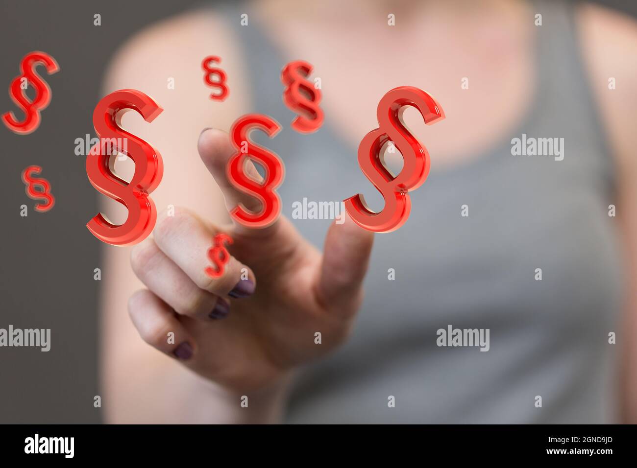 3d render of a Symbol of Law and Justice and male hand on a blurry ...