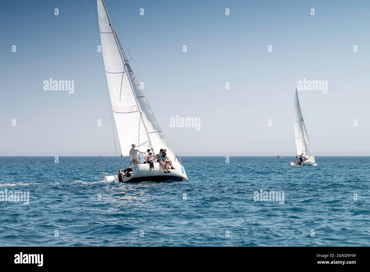 Sailboats under sails during racing competition Stock Photo - Alamy