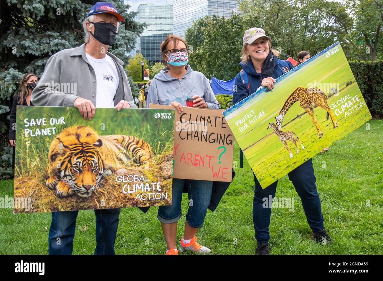 A family with animal banners during the Global Climate March organized ...