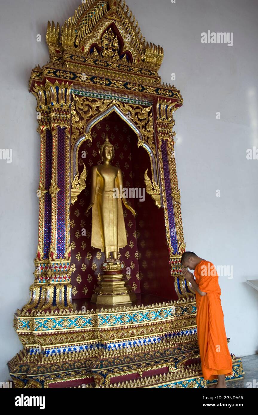 Buddhist monk in temple door hi-res stock photography and images - Alamy