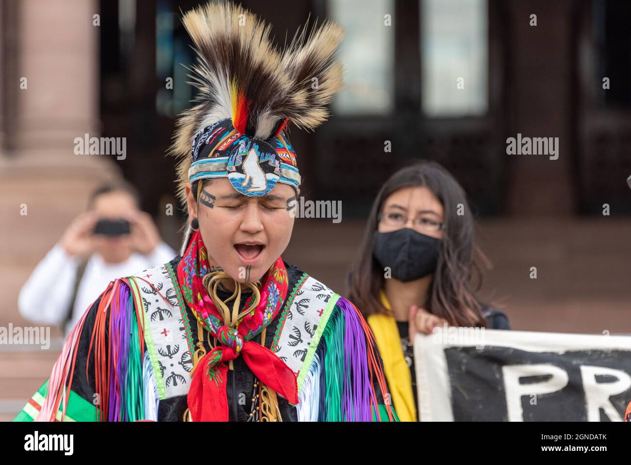 First Nations of Canada male person singing during the Global Climate ...