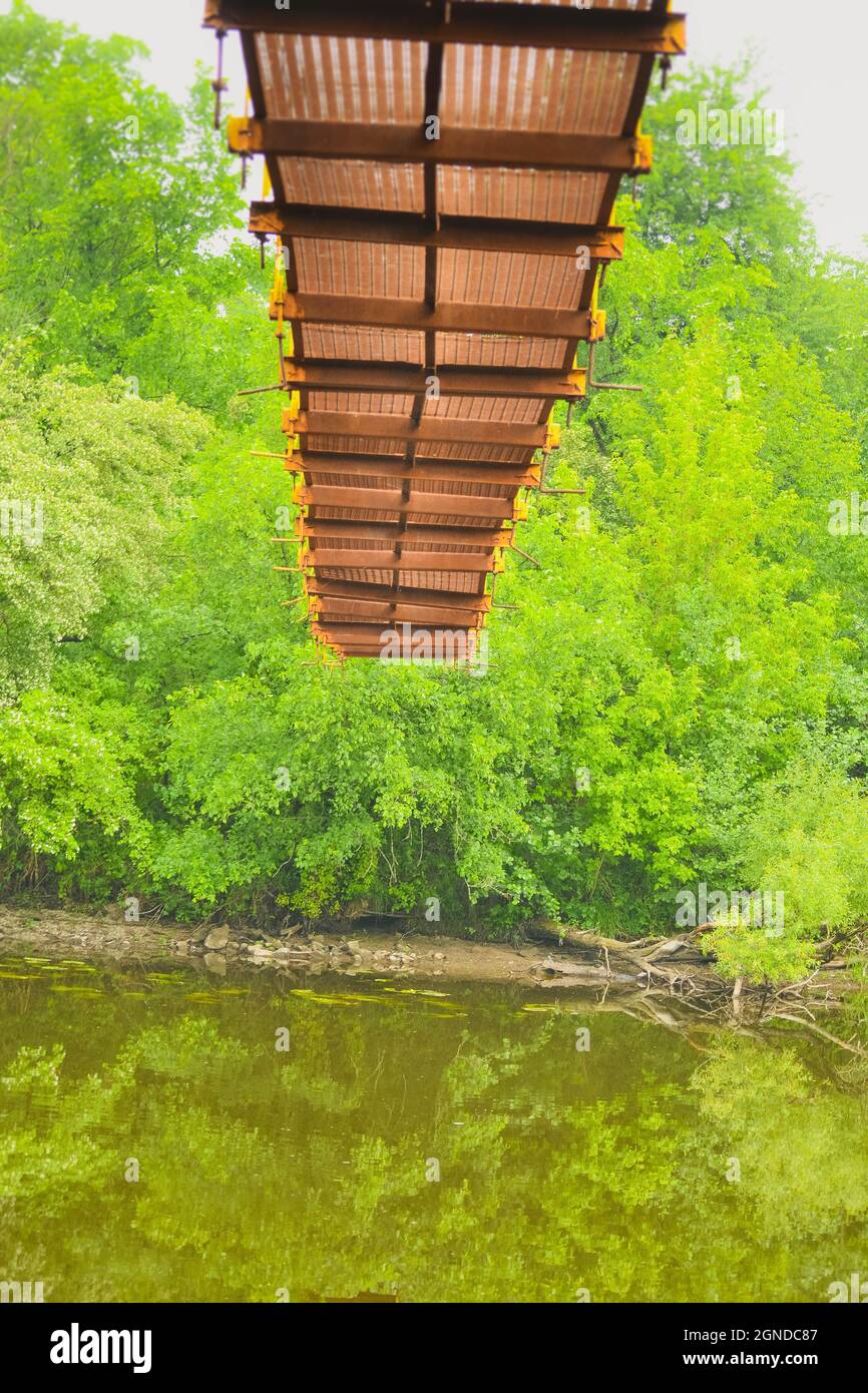 Hanging bridge from below Stock Photo - Alamy