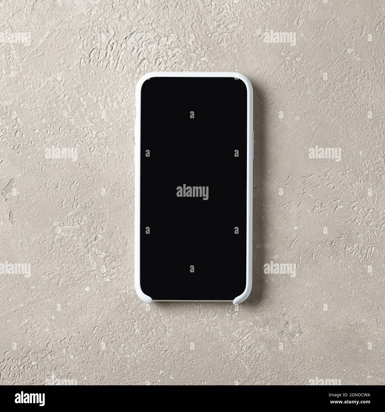 smartphone on beige color table, top view Stock Photo - Alamy