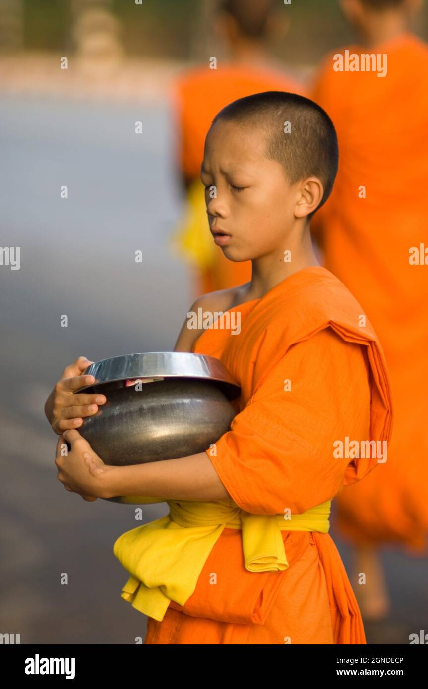 Monk with alms hi-res stock photography and images - Alamy