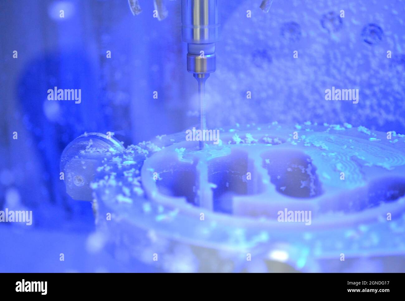 Dental milling machine carving out shape of human teeth Stock Photo - Alamy