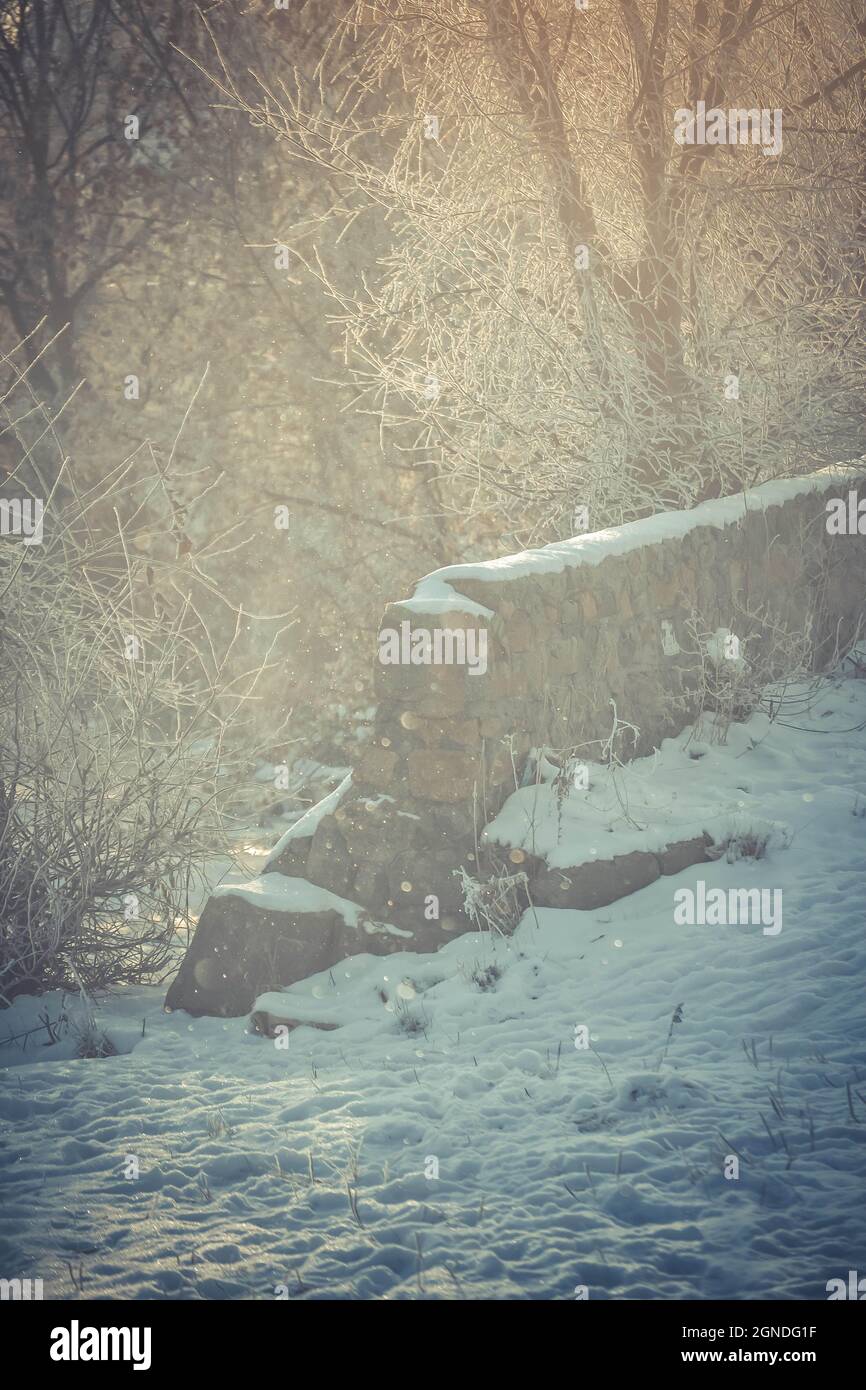 Old stone wall snow winter hi-res stock photography and images - Alamy