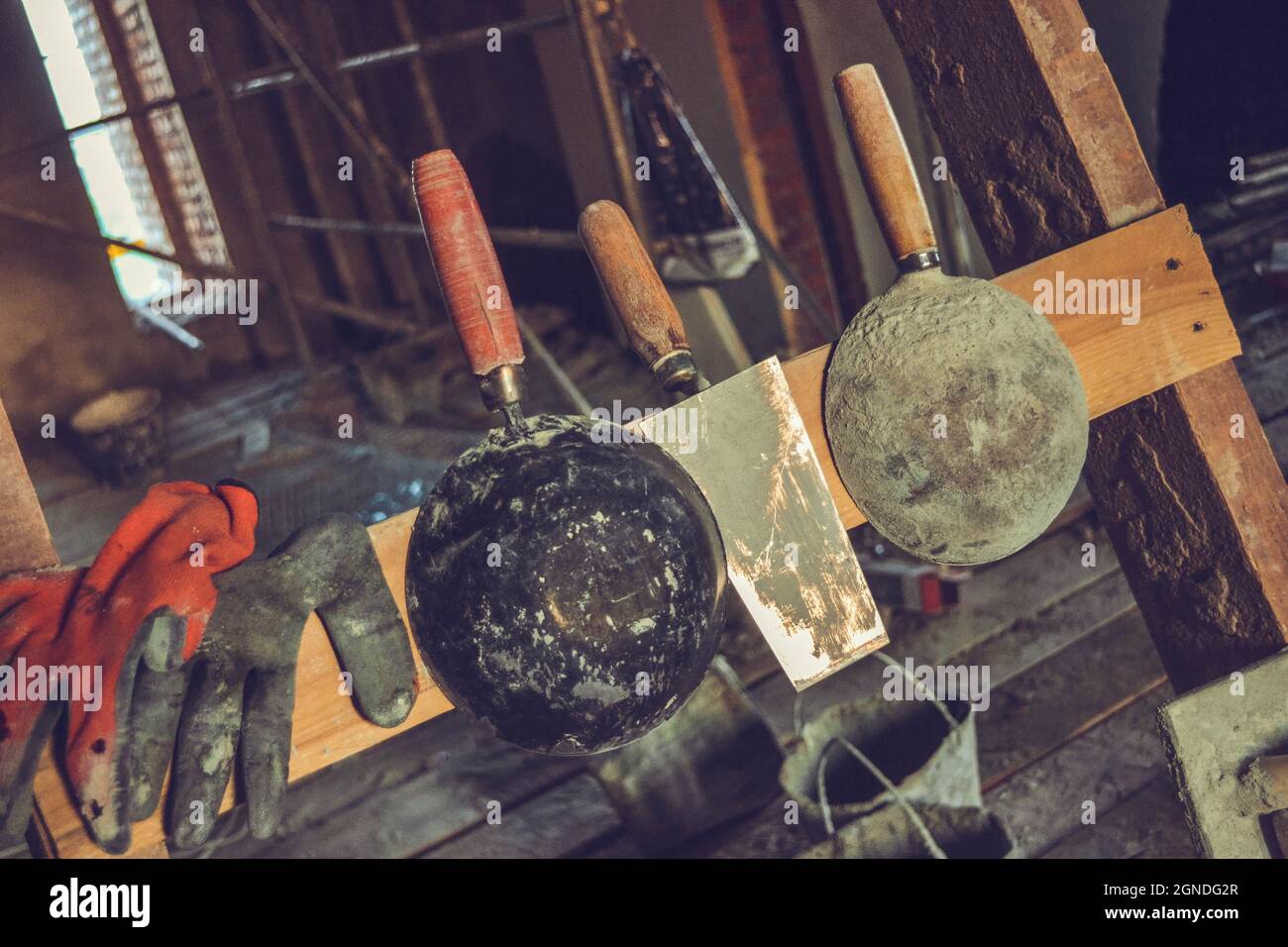 Dirty construction tools Stock Photo - Alamy