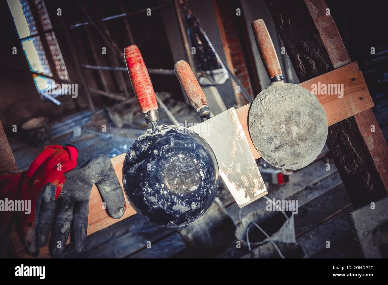 Dirty construction tools Stock Photo - Alamy