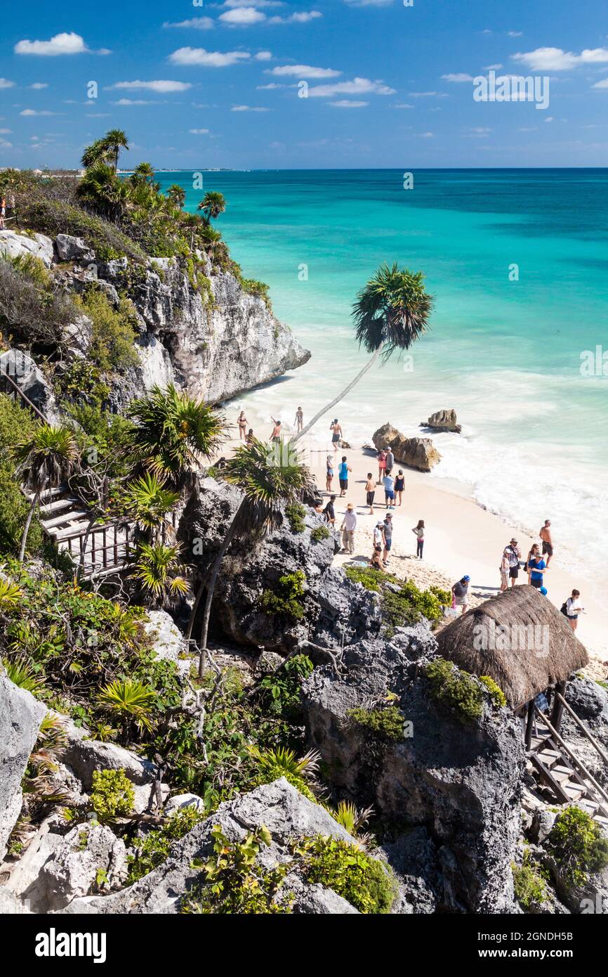 TULUM, MEXIO - FEB 29, 2016: Tourists at the beach under the ruins of ...