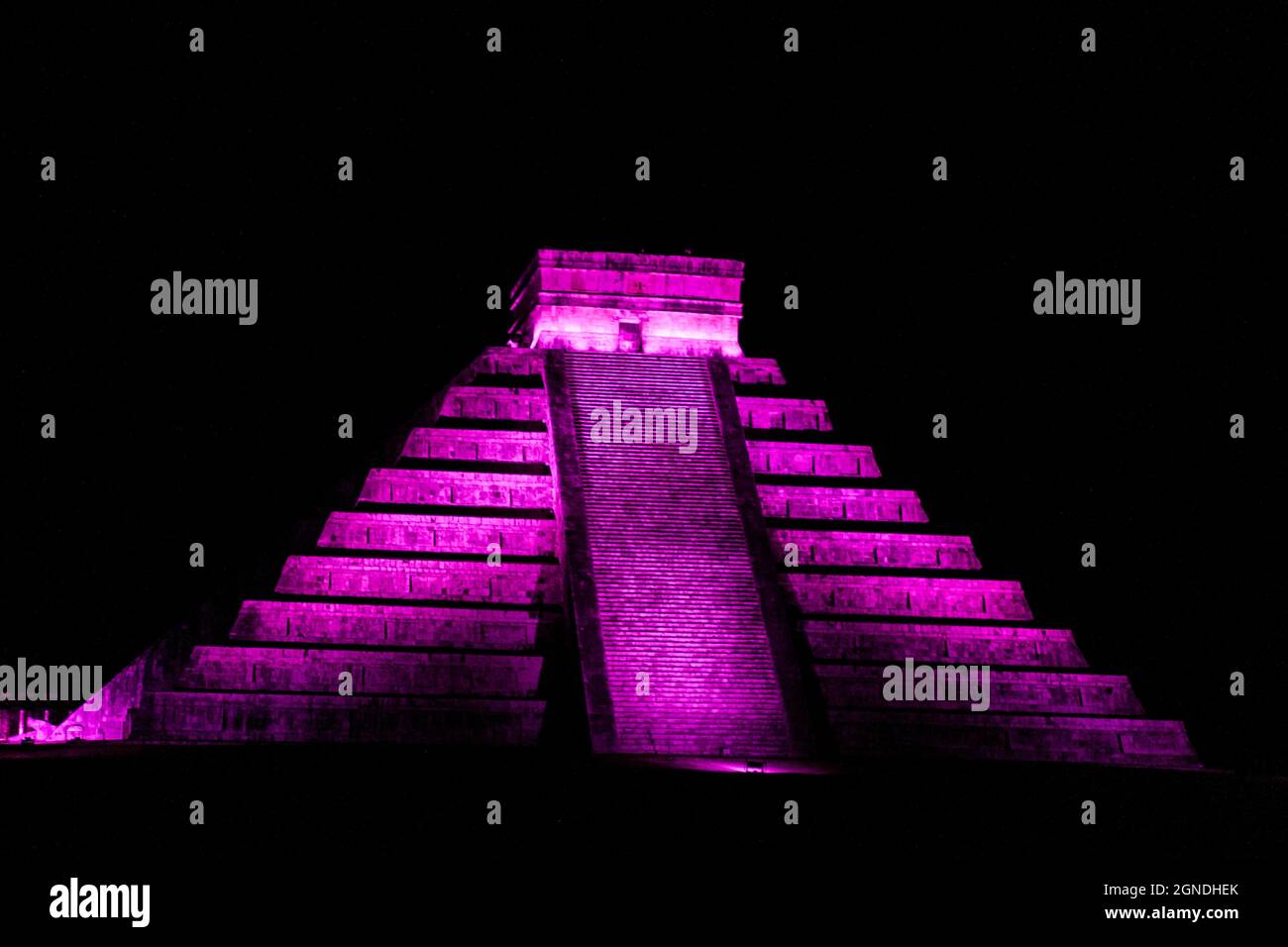 Night view of Kukulkan pyramid in ancient Mayan city Chichen Itza ...