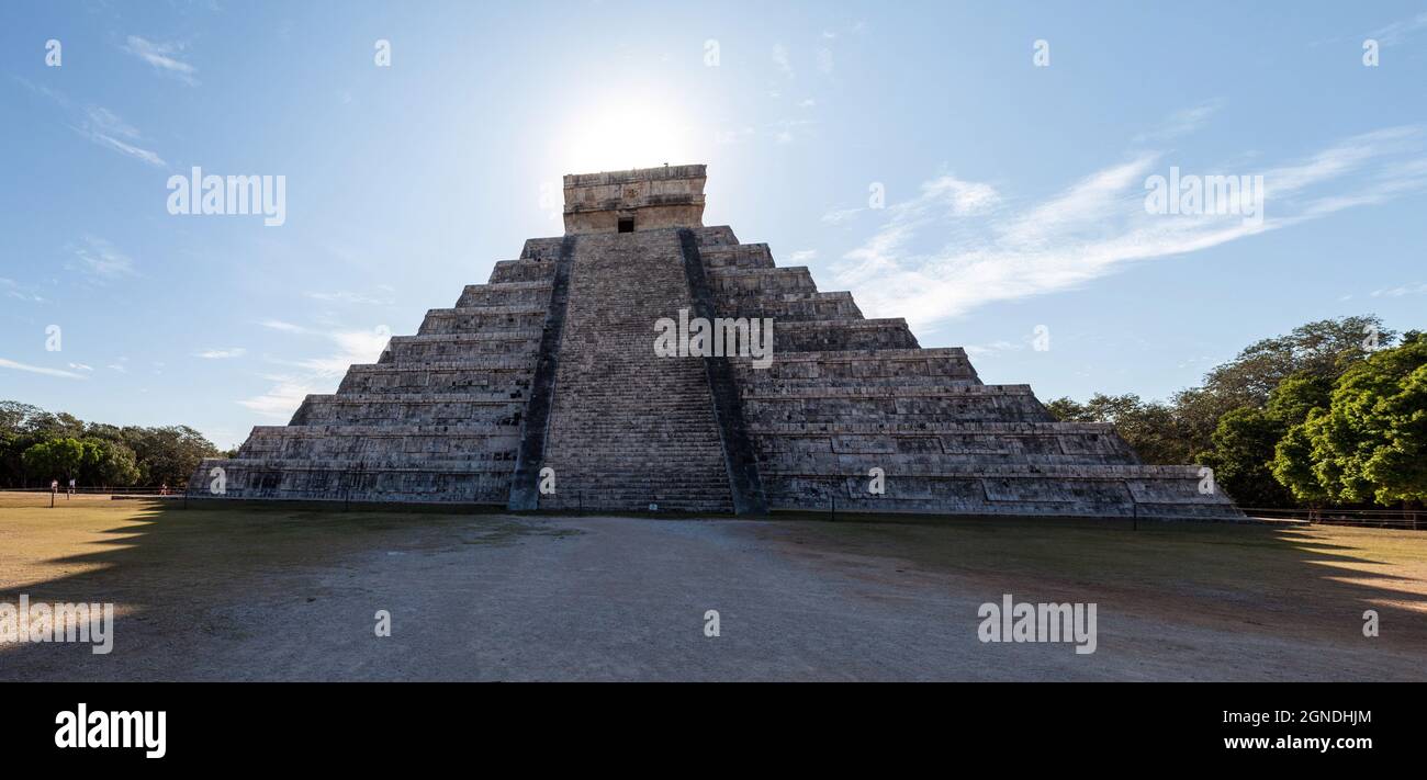 Early morning shadow of the pyramid Kukulkan in the Mayan archeological ...