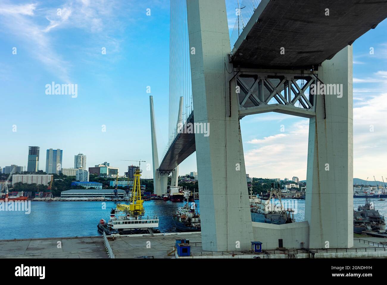 Urban landscape with a view of the Golden Bridge. Vladivostok, Russia ...