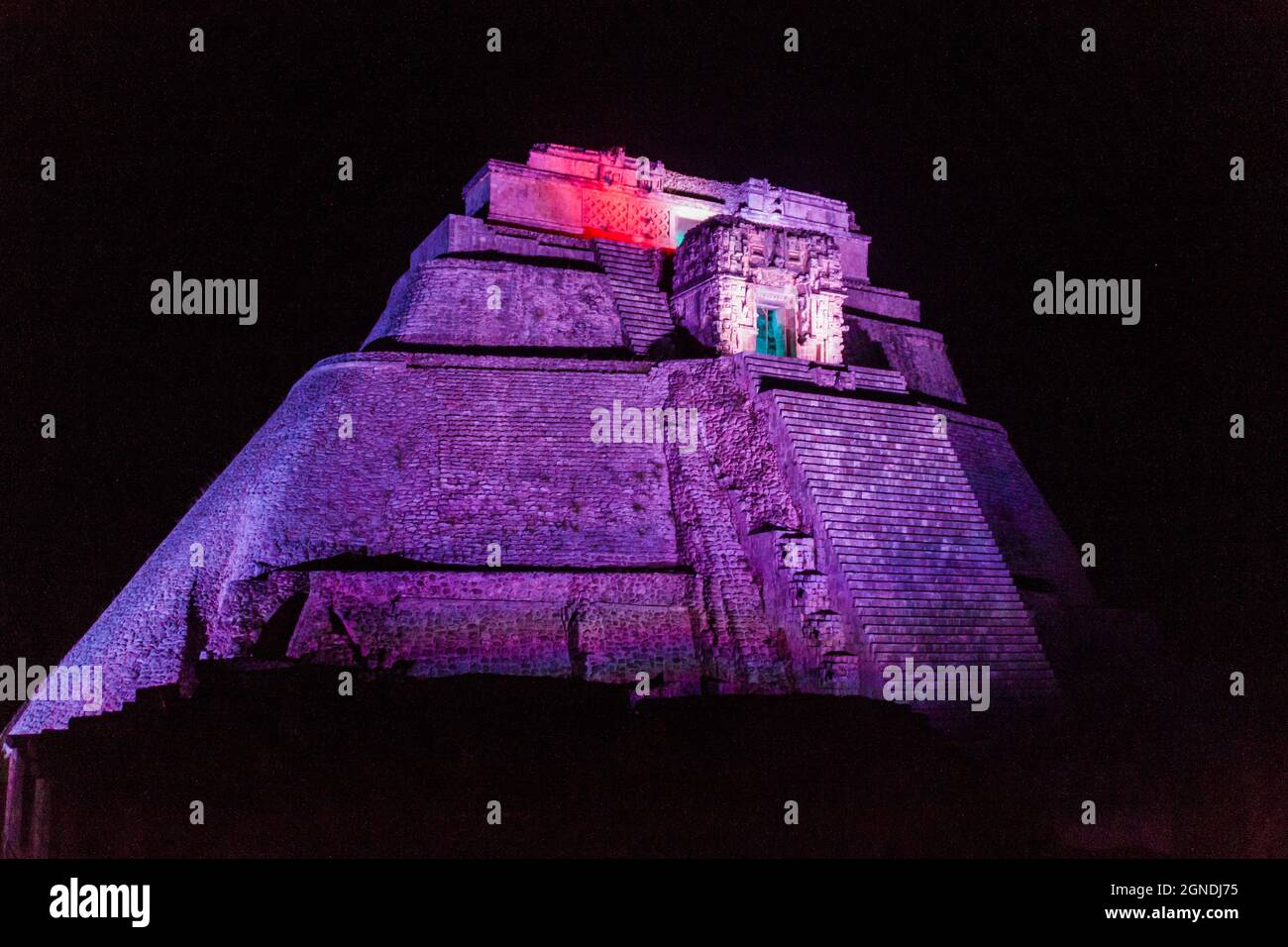 Nightly illuminated Pyramid of the Magician Piramide del adivino in ...