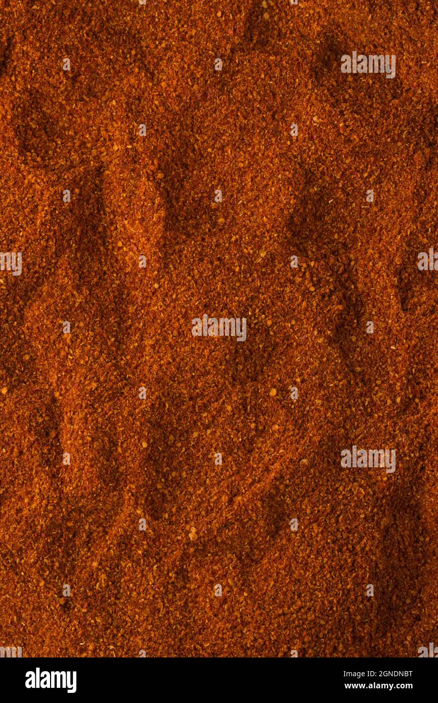 ground dried red chilli, spicy pepper powder background, taken from ...