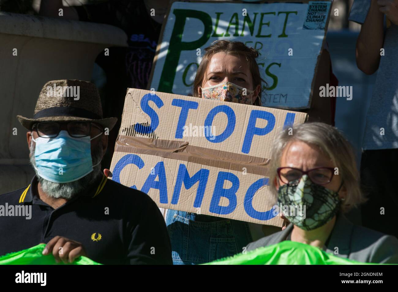 London, UK. 24th September, 2021. A climate activist holds a Stop Cambo ...