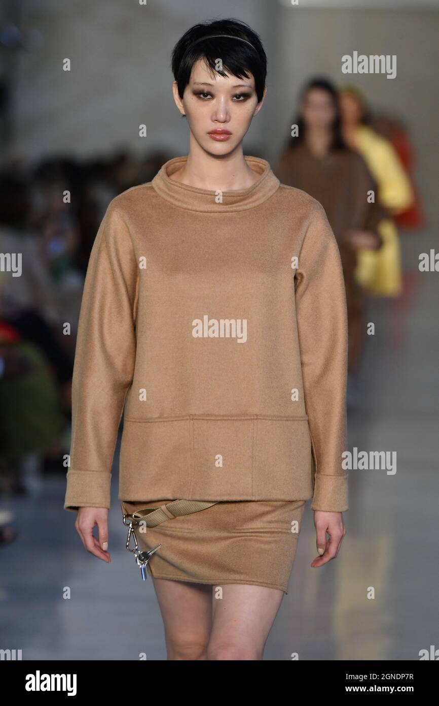 Model walks on the runway at the Max Mara fashion show during Spring ...