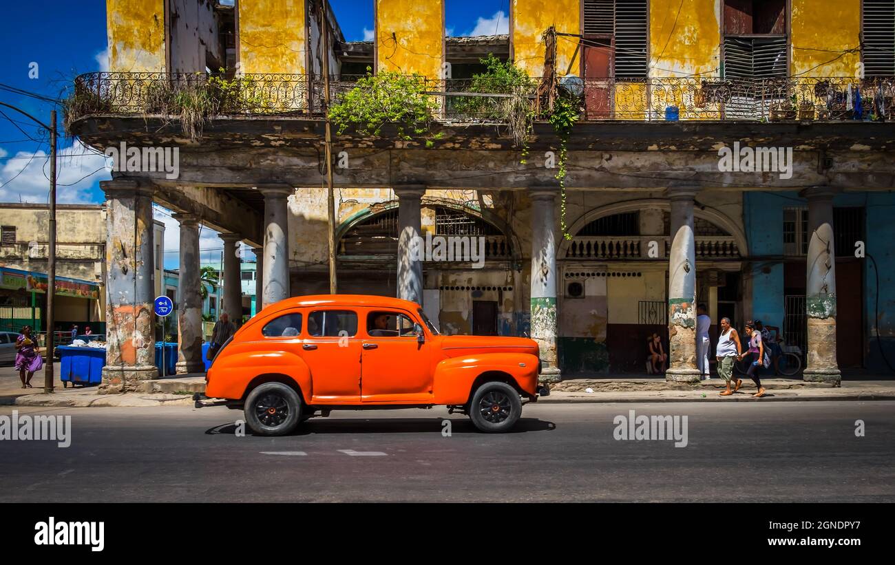 Havana, Cuba, July 2019, view of an orange old American car driving in ...