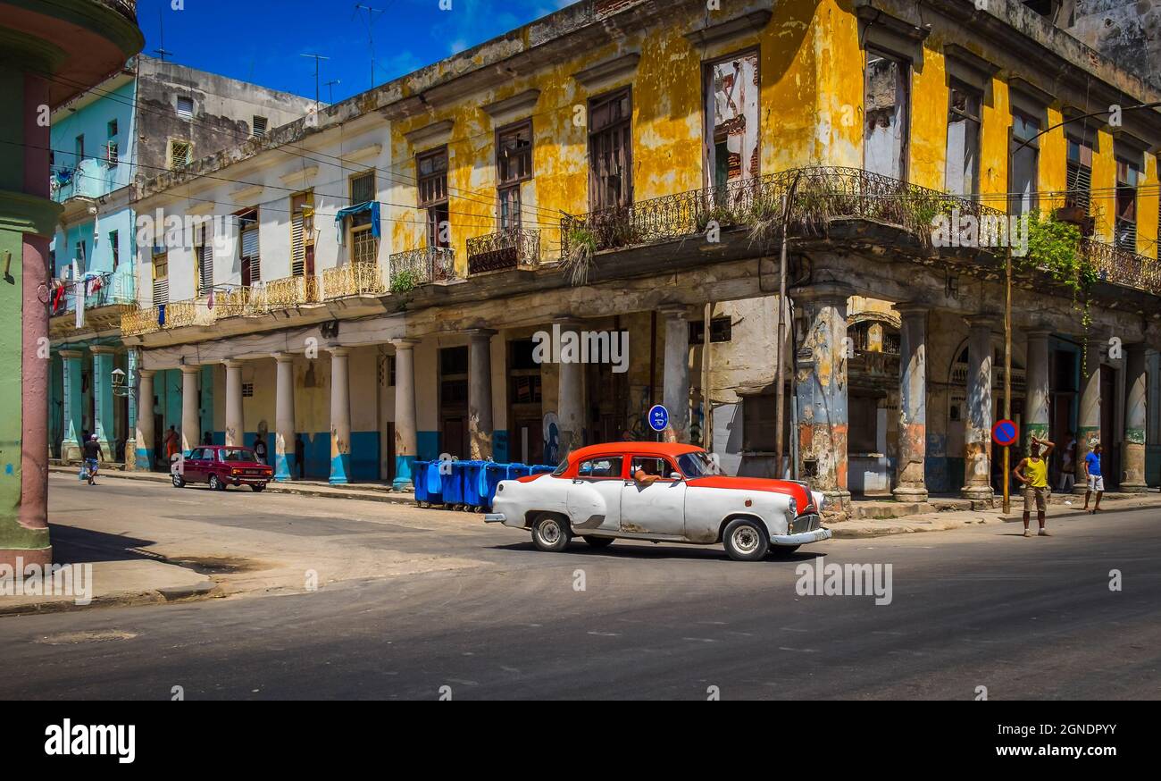 Havana, Cuba, July 2019, Chevrolet car driving in front of a colourful ...