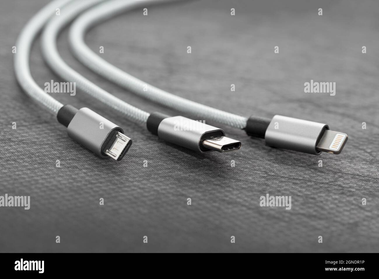 Three types of peripheral connections and charging or data cables ...