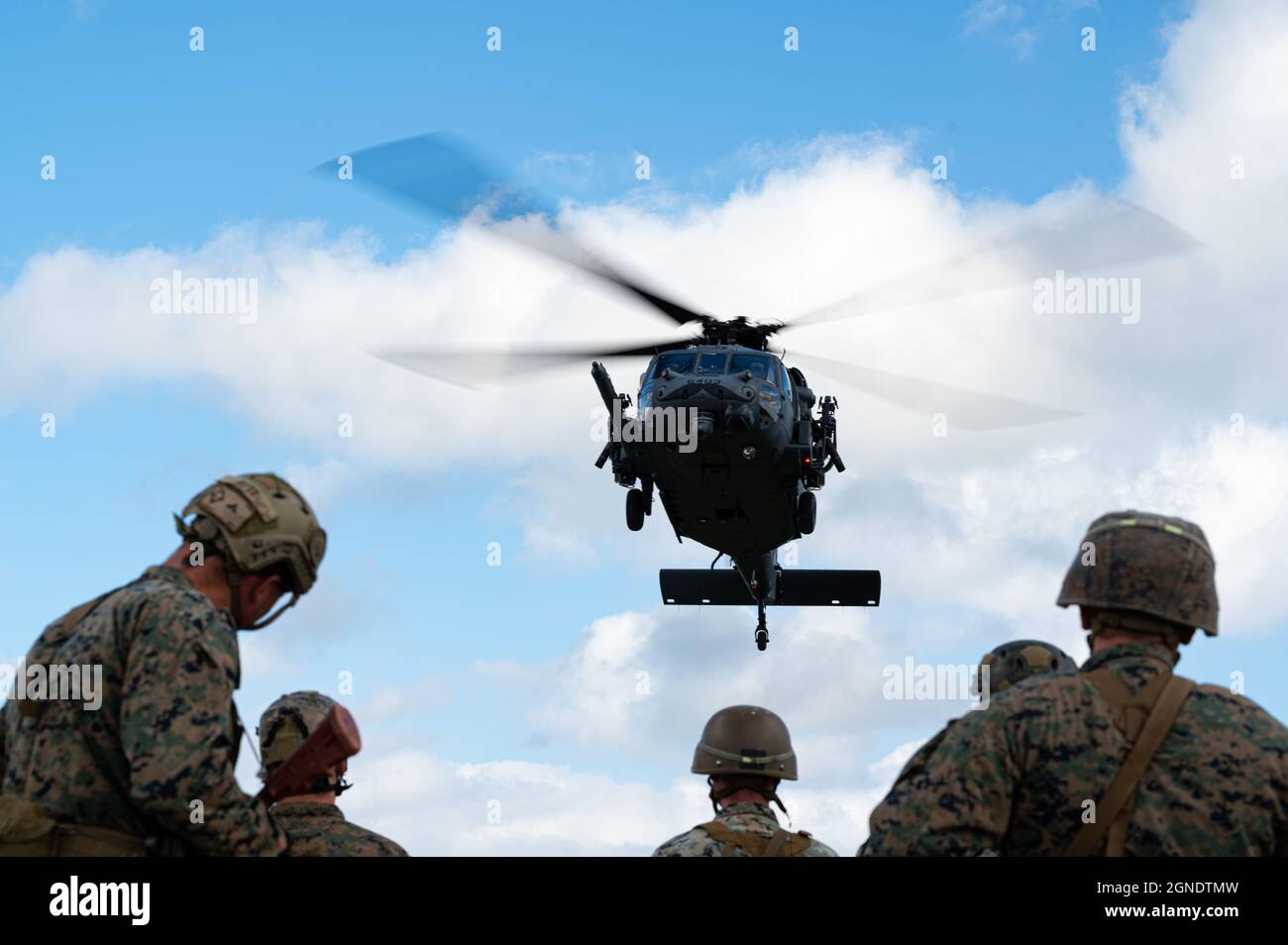 A 33rd Rescue Squadron HH-60 Pavehawk helicopter hovers while U.S ...