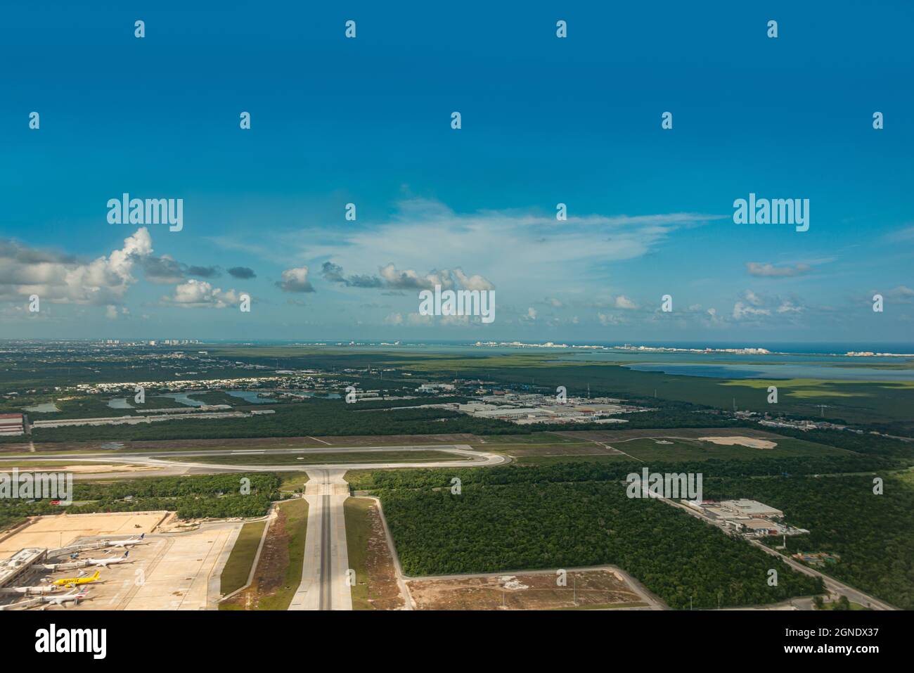 Sky view of Cancun´s international airport, Mexico from an airplane ...