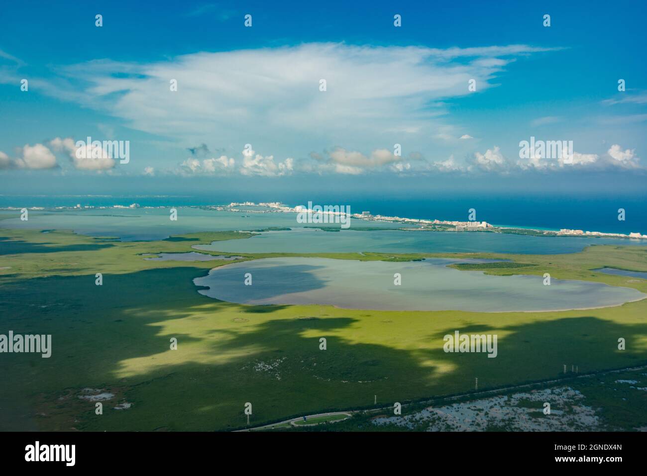 Sky view of Cancun Hotel Zone and Nichupte Lagoon, Mexico from an ...