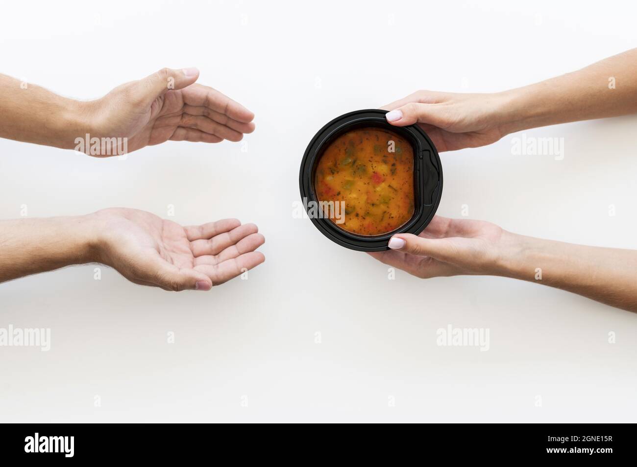 hand giving bowl soup needy person. High quality and resolution ...