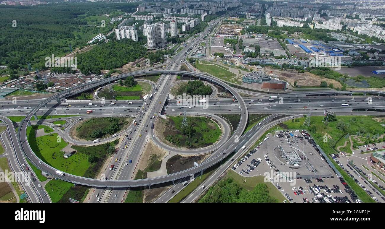An aerial view of a huge and busy road junction in the middle of the ...