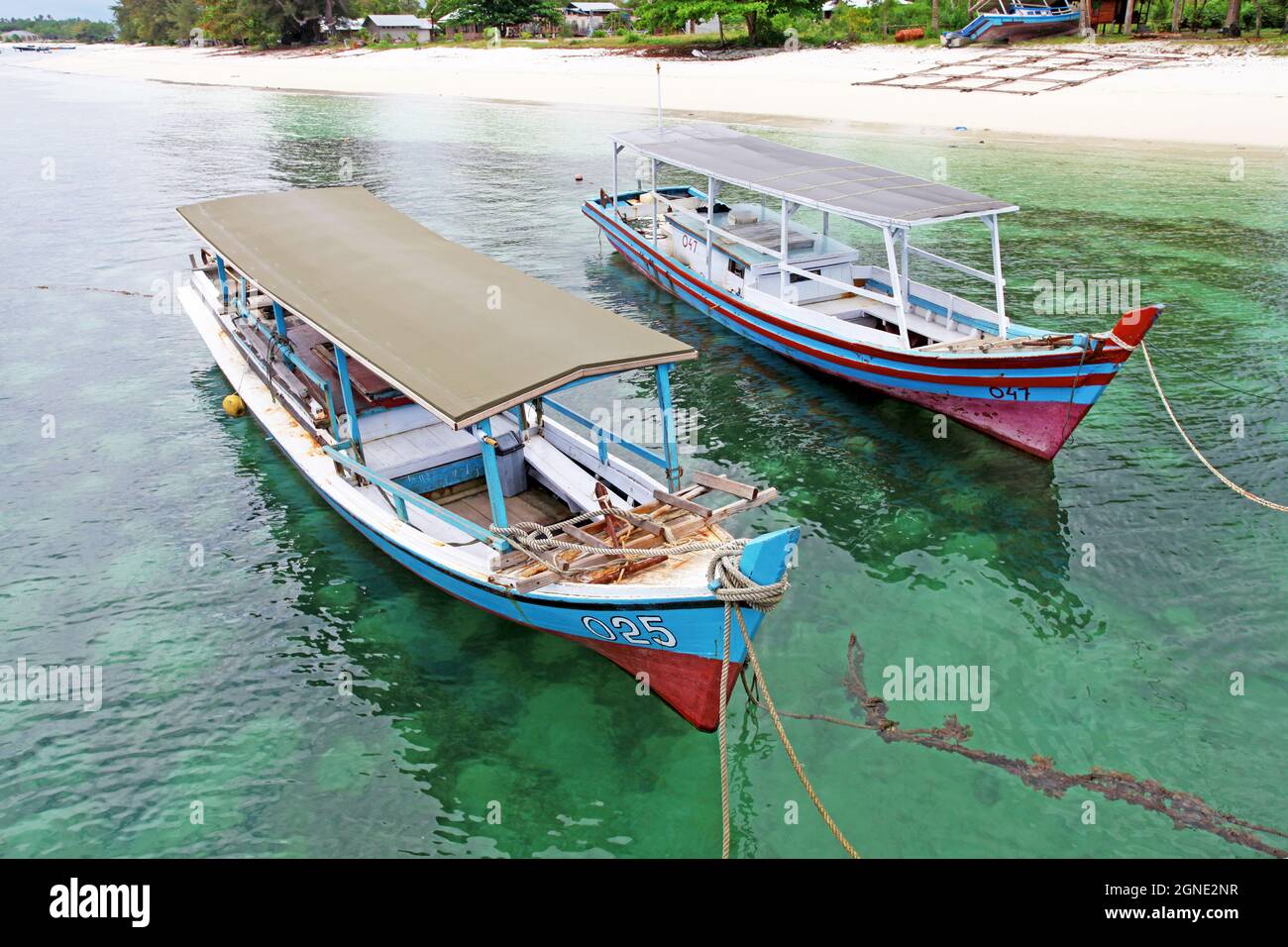 Colourful boats at Kelayang Beach in Tanjung Kelayang located in the ...