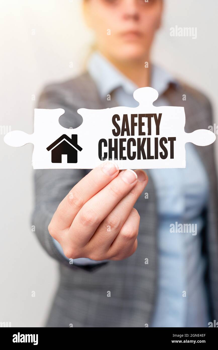 Hand writing sign Safety Checklist. Business concept list of items you ...