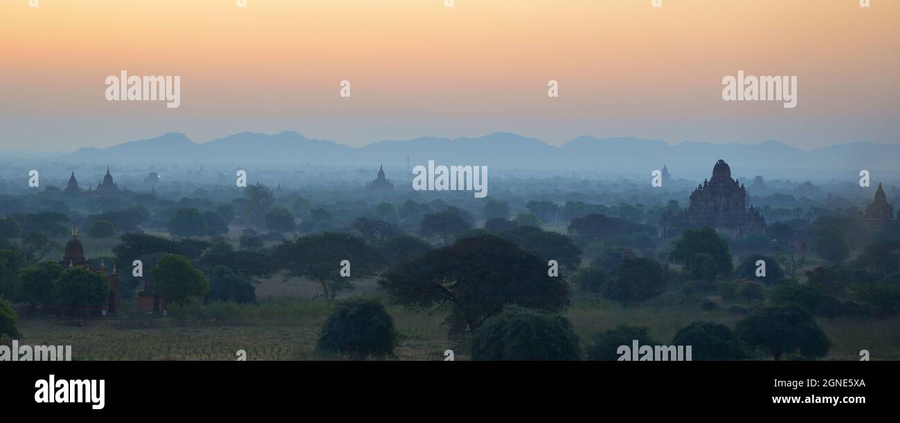 Beautiful sunrise scene in Bagan (Myanmar) with a complex of ancient ...