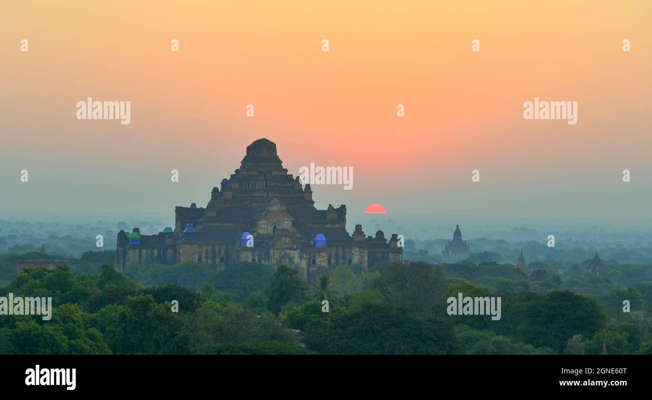 Beautiful sunrise scene in Bagan (Myanmar) with a complex of ancient ...