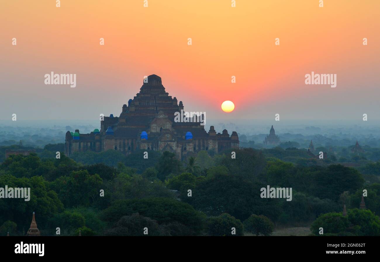 Beautiful sunrise scene in Bagan (Myanmar) with a complex of ancient ...